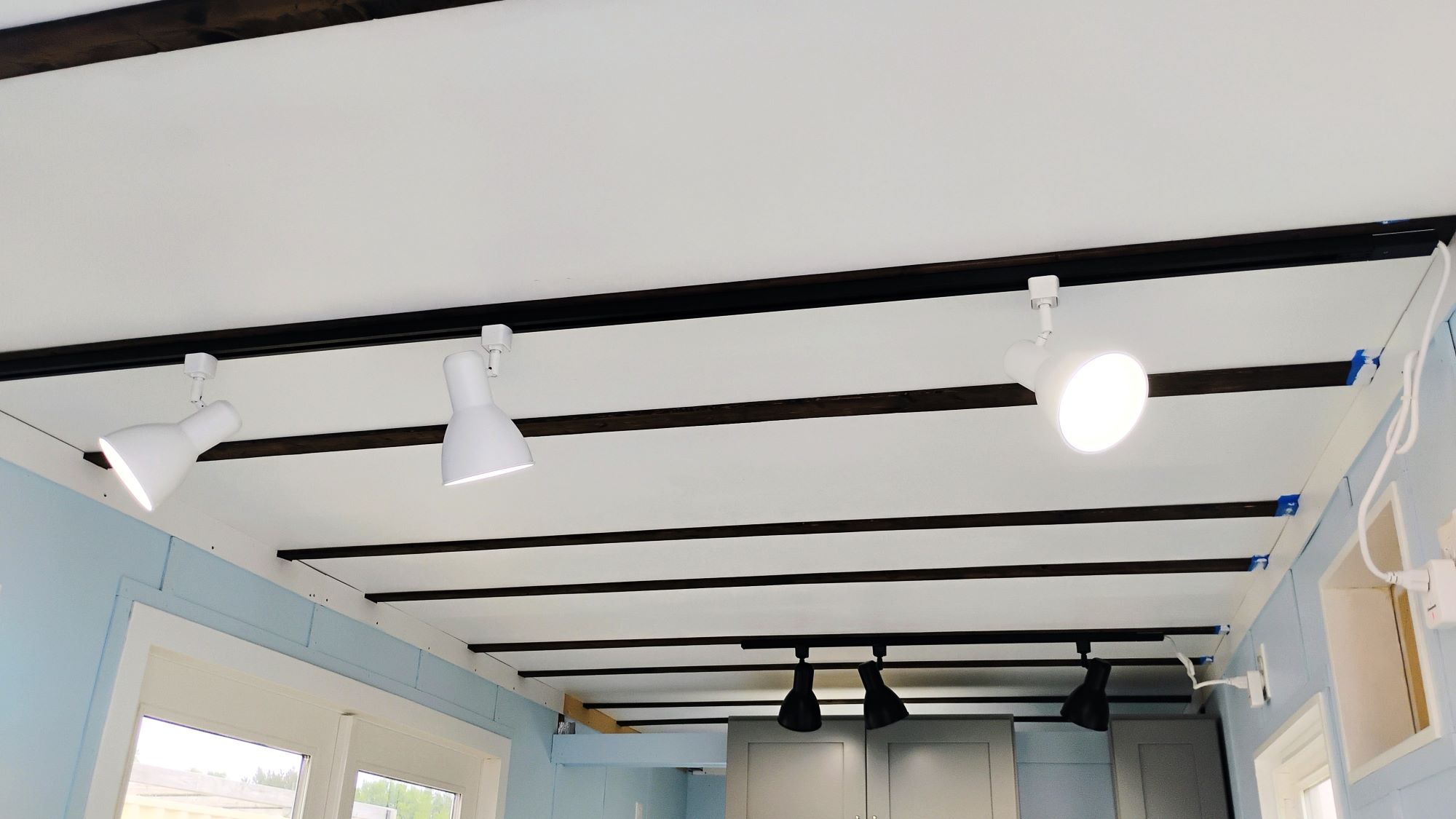Lighting the Future: The Track Light Transformation - Tiny House Container